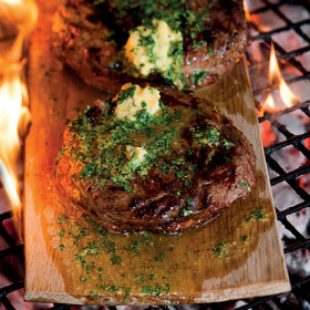 Rump steaks on oak braai planks with mustard butter | Woolworths.co.za