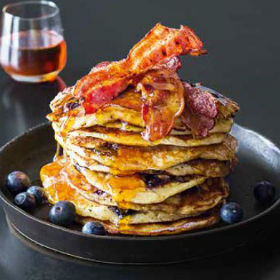 Buttermilk blueberry hotcakes with bacon and maple syrup | Woolworths.co.za