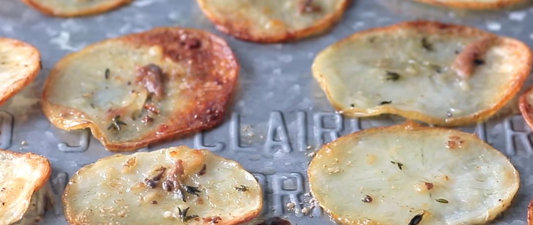Garlic, thyme and anchovy roast potatoes sheets | Woolworths.co.za