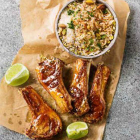 Lamb cutlets with coconut, lime and pistachio pilaf | Woolworths.co.za